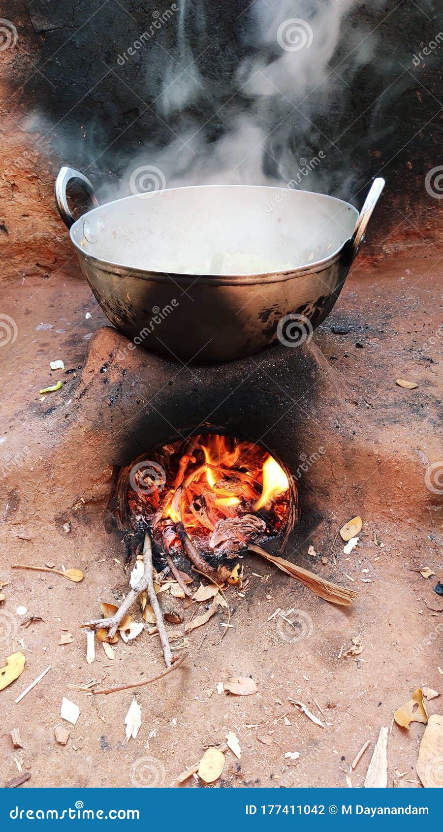 Urban Cooking Style. the Dish is on the Fire . Some of Smoke is ...