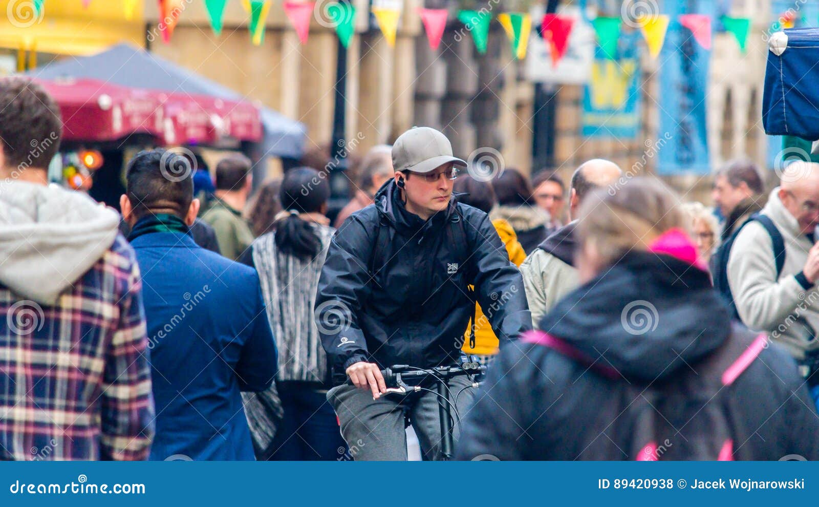 Urban Cyclist in the Crowd editorial stock photo. Image of england ...