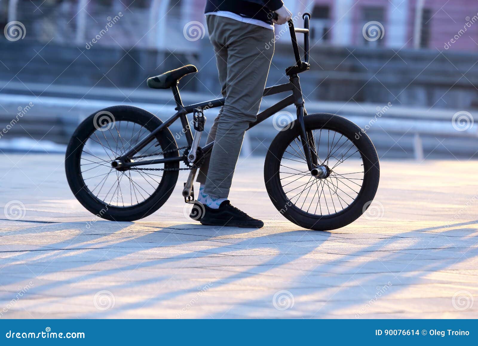 Urban Cyclist in Motion on the Sidewalk Stock Photo - Image of action ...