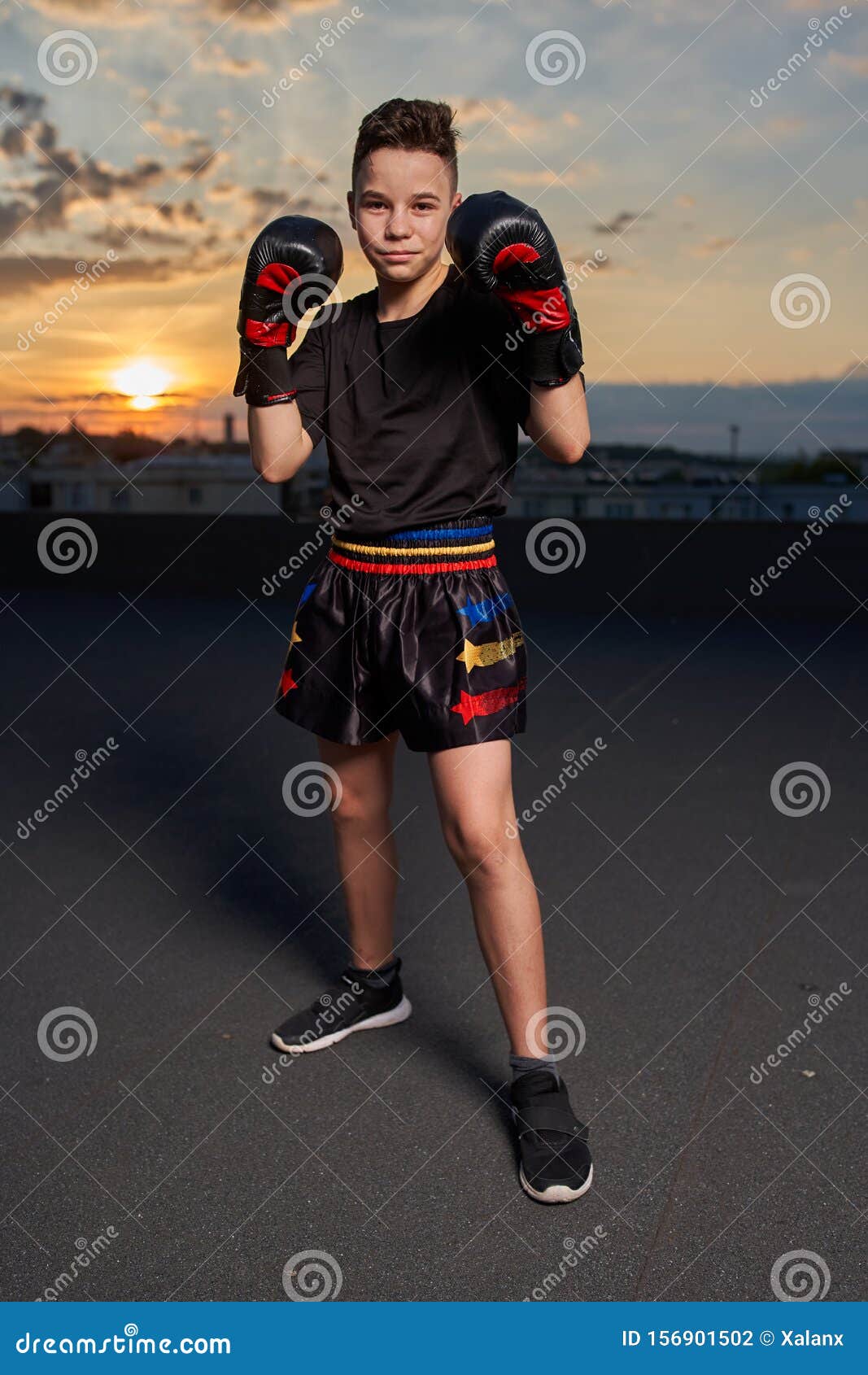 Urban Fighter Training at Sunset Stock Photo - Image of punch, people ...