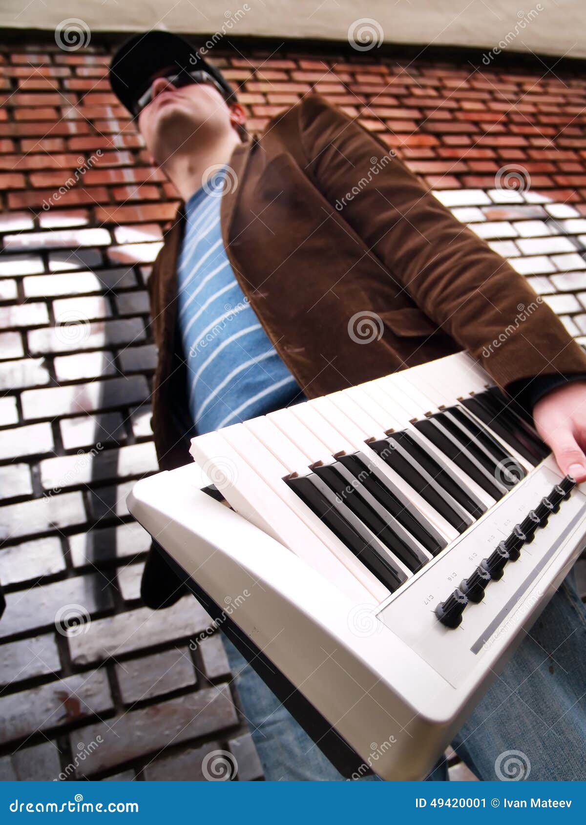 Urban Guy with a Keyboard stock image. Image of person - 49420001