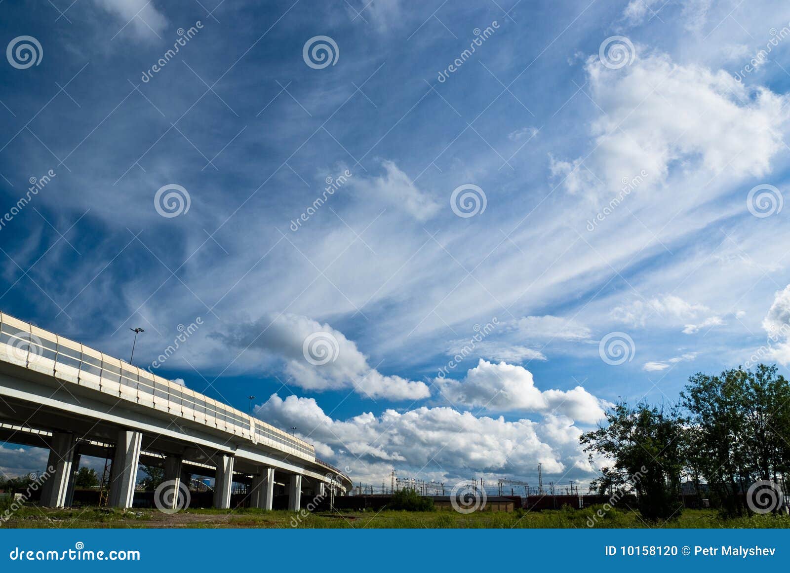 Urban Landscape with Highway and Clouds Stock Photo - Image of road ...