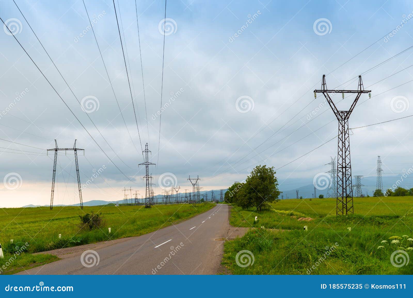 Urban Landscape of Power Lines in a Field Stock Image - Image of cable ...