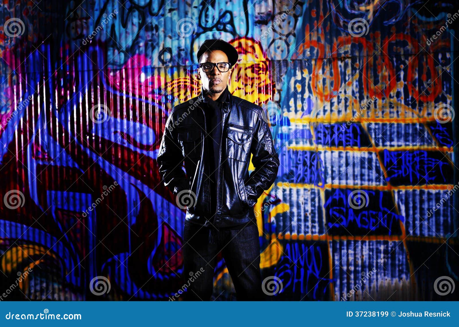 Urban Man in Front of Graffiti Wall. Stock Image - Image of posing ...