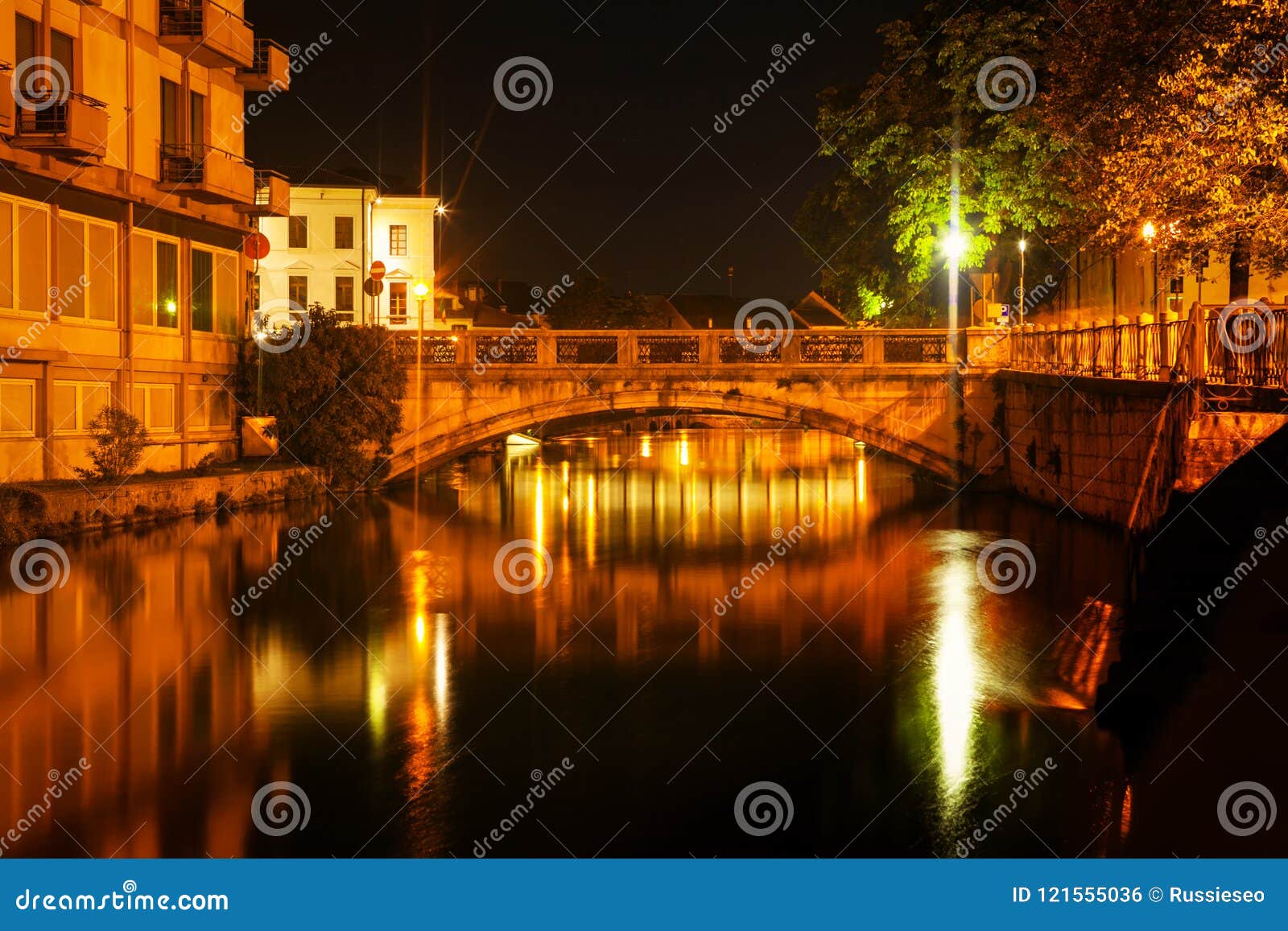 Flowing river in the night stock photo. Image of urban - 121555036