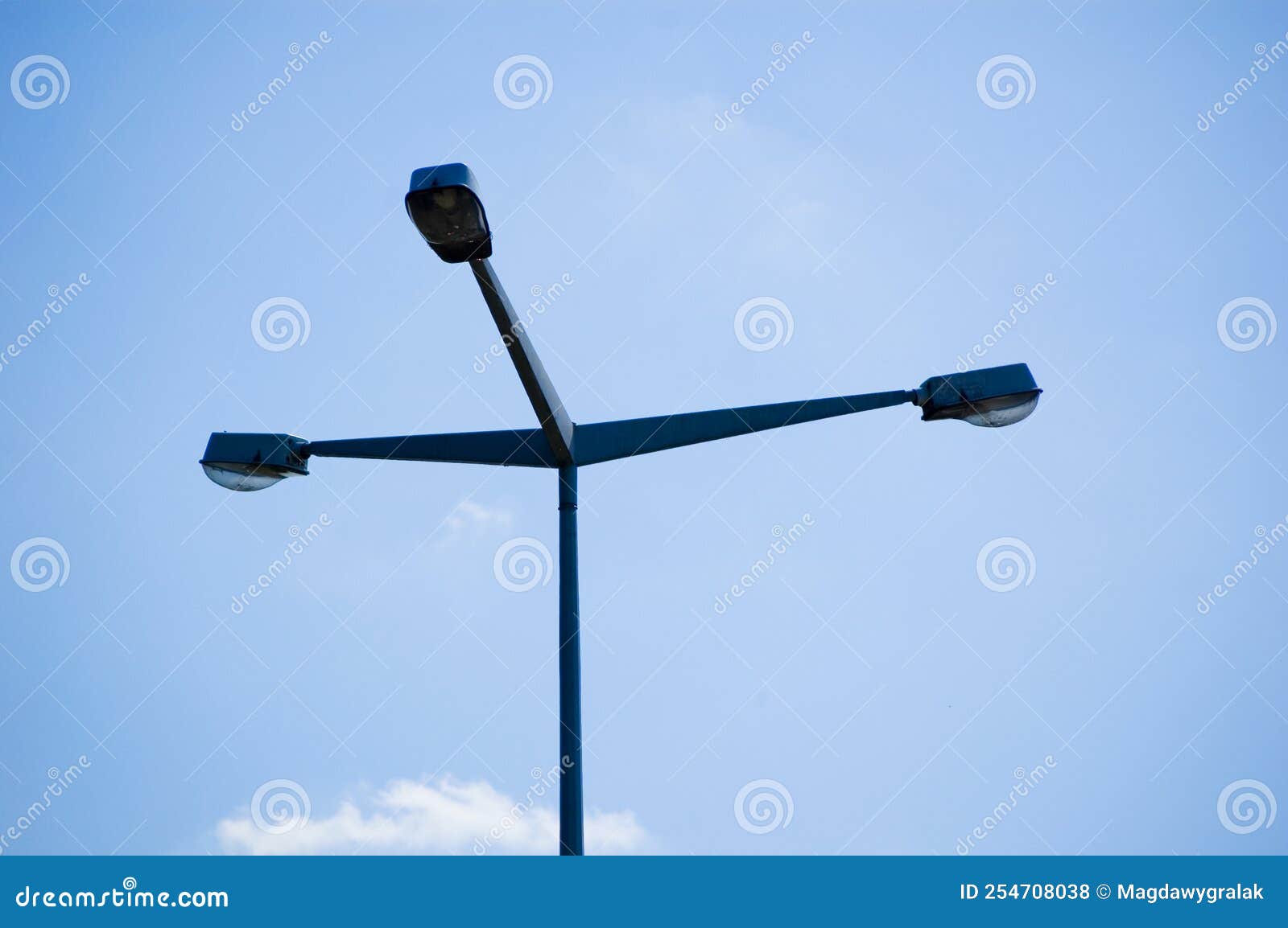 Urban Street Triple Light Against Blue Sky Stock Photo - Image of stand ...