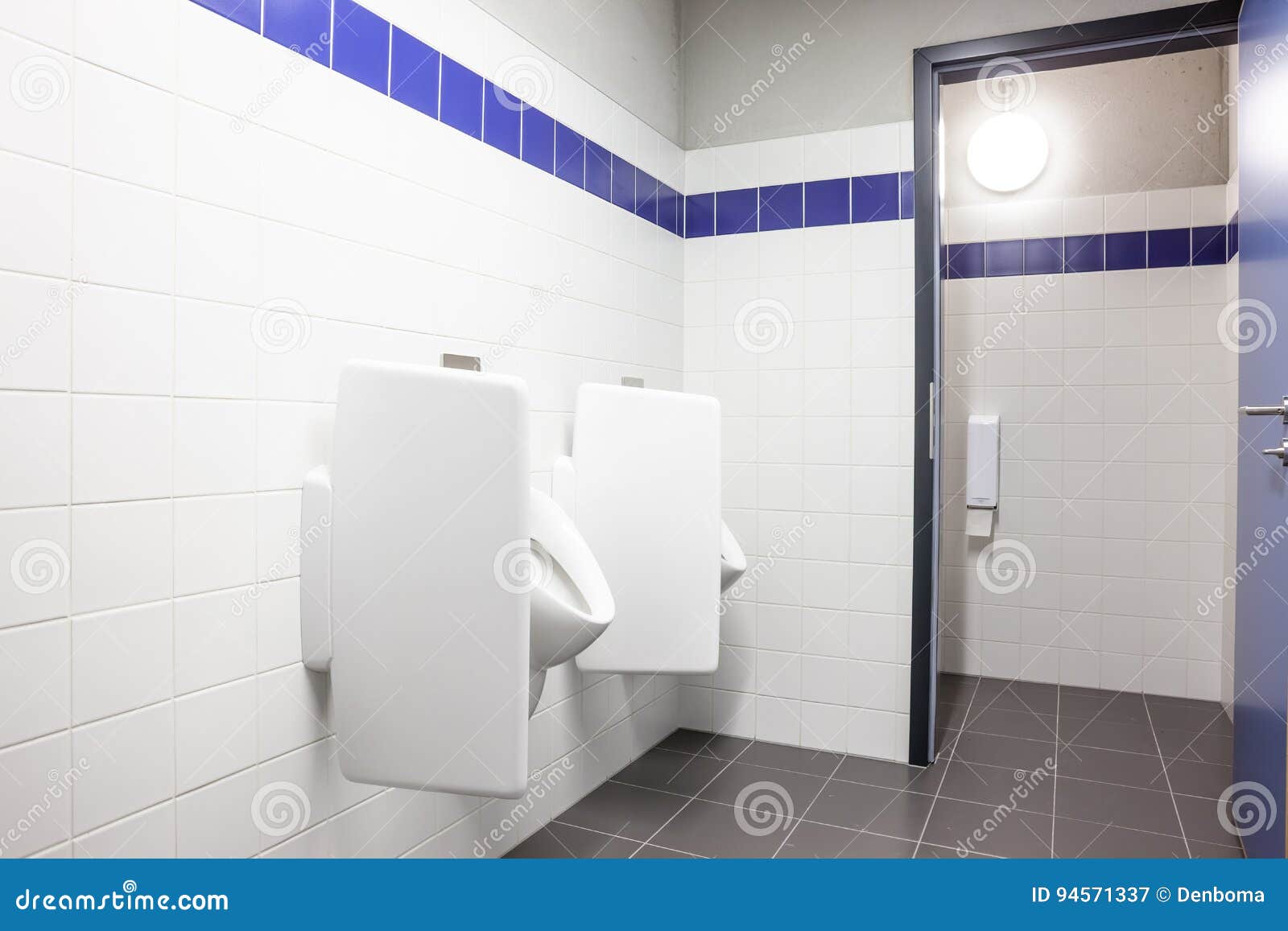 Urinal and toilet doors stock image. Image of public - 94571337