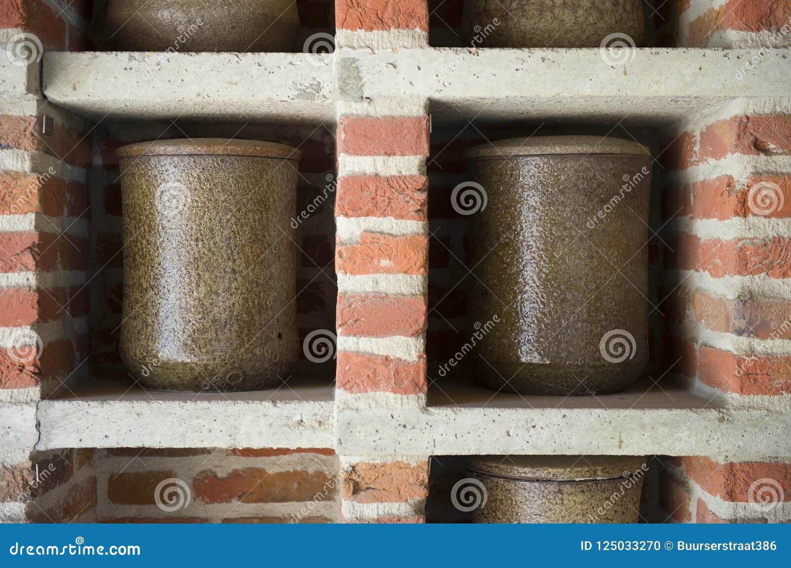Urns in wall stock photo. Image of graveyard, cemetery - 125033270