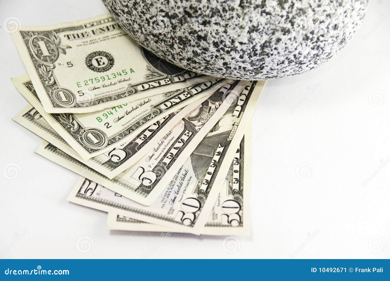 US 1,5,50 Dollar Bill and a Rock Stock Image - Image of white, states ...