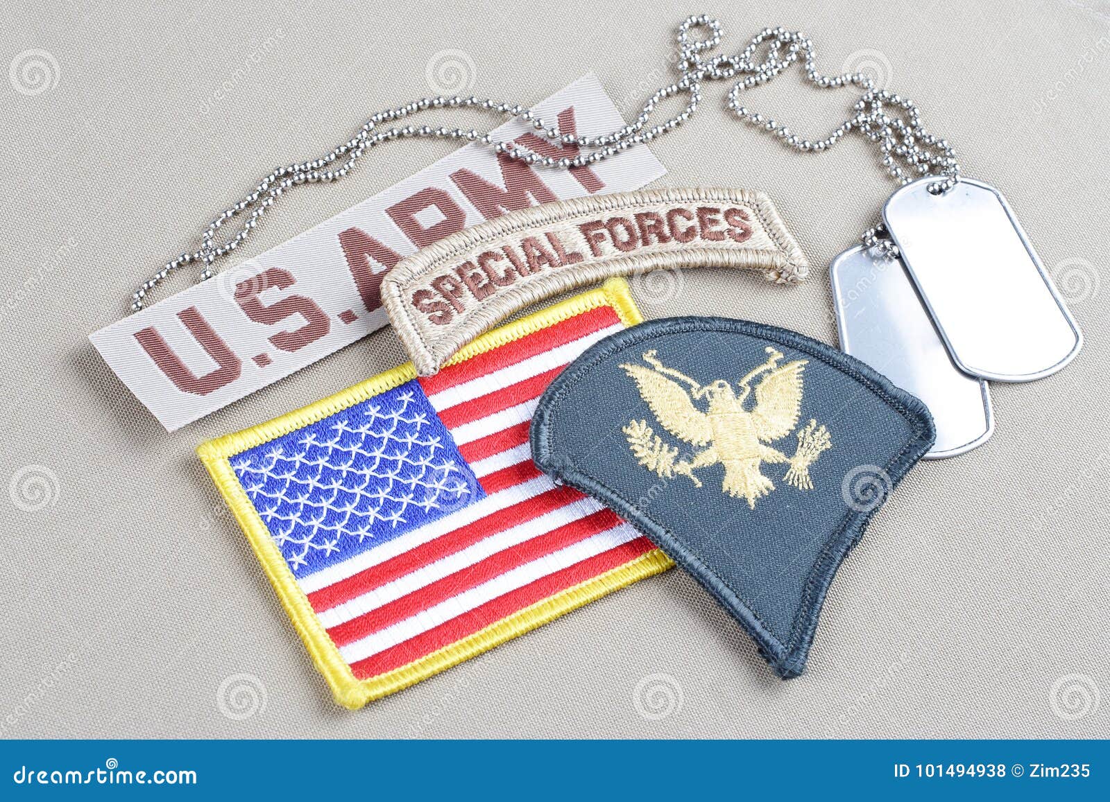 US ARMY Specialist Rank Patch On Desert Uniform Royalty-Free Stock ...