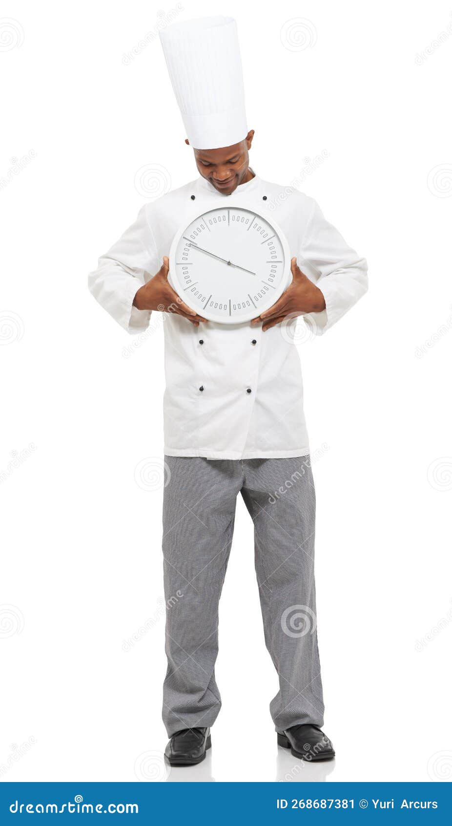 Us Chefs are always on the Clock. Portrait of an African Chef Holding a ...