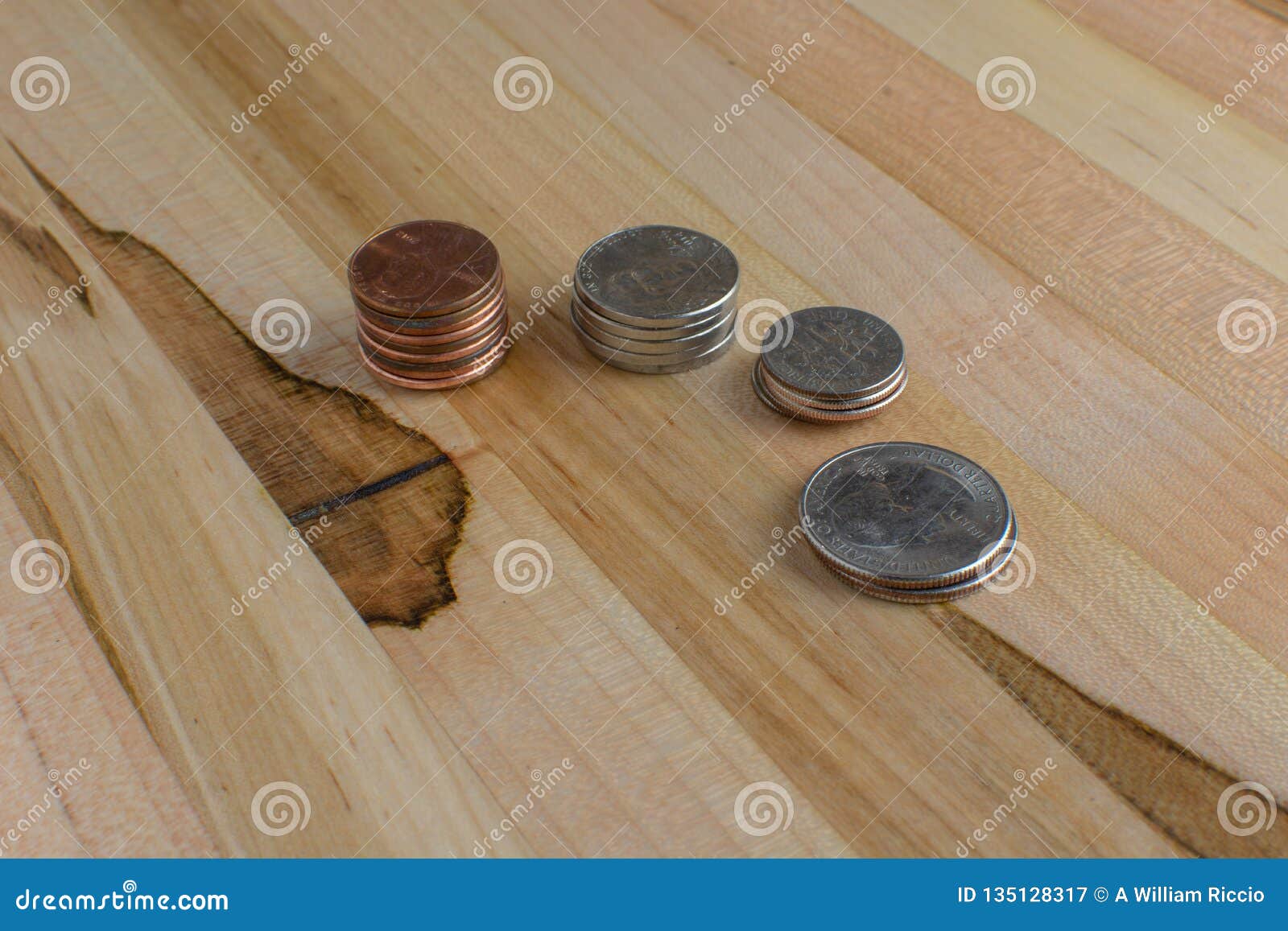 US Currency Cents in Stacks on Wooden Table Stock Image - Image of ...