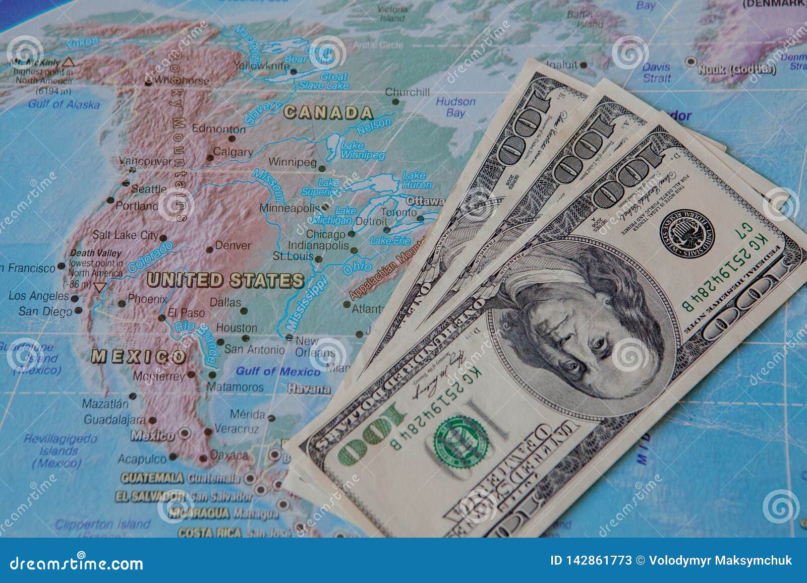 US Dollar Banknotes on World Globe Map Stock Image - Image of economy ...