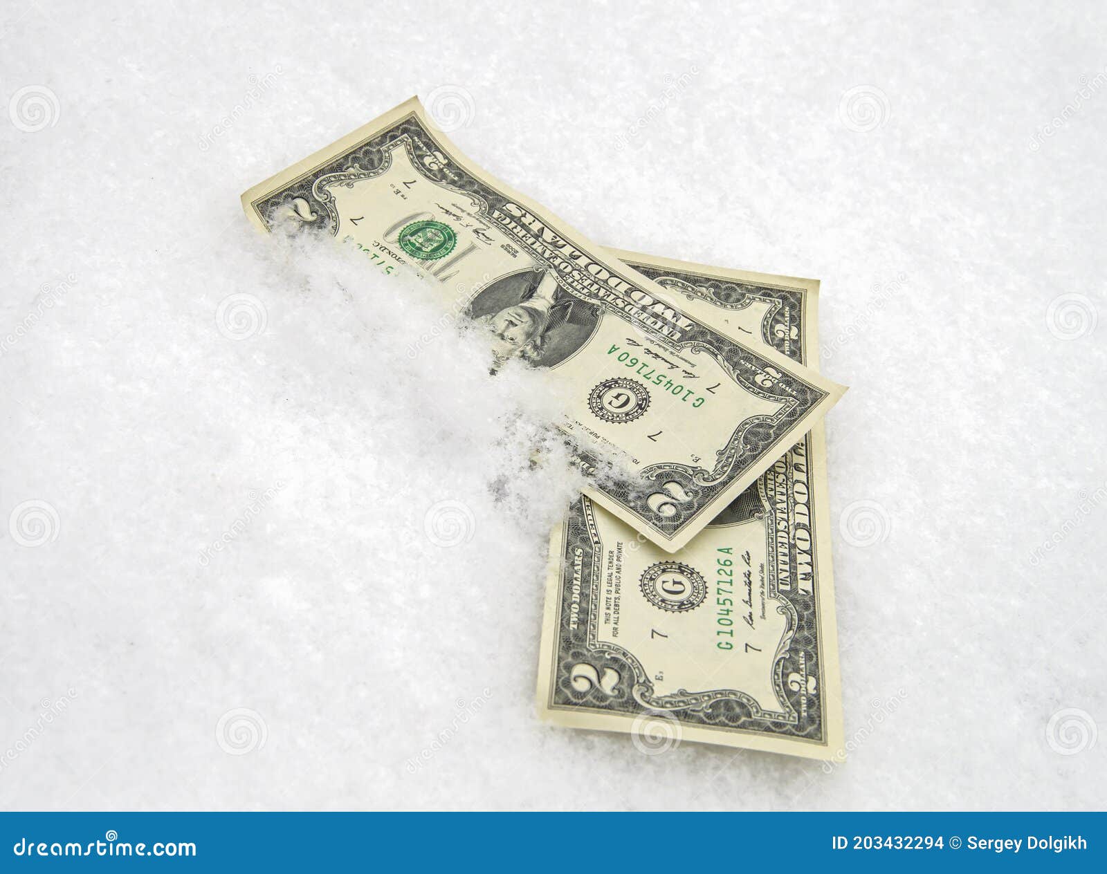 US Dollar in the Snow. Two Dollar Bills Stock Photo - Image of concept ...