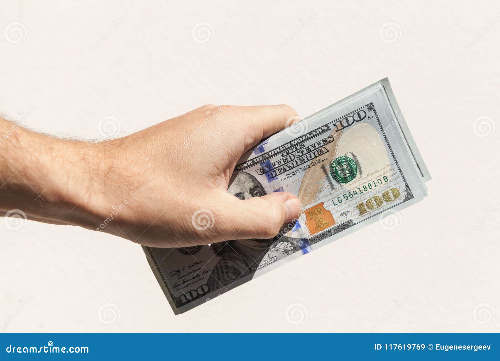 US Dollars Notes in Male Hand Stock Image - Image of give, male: 117619769