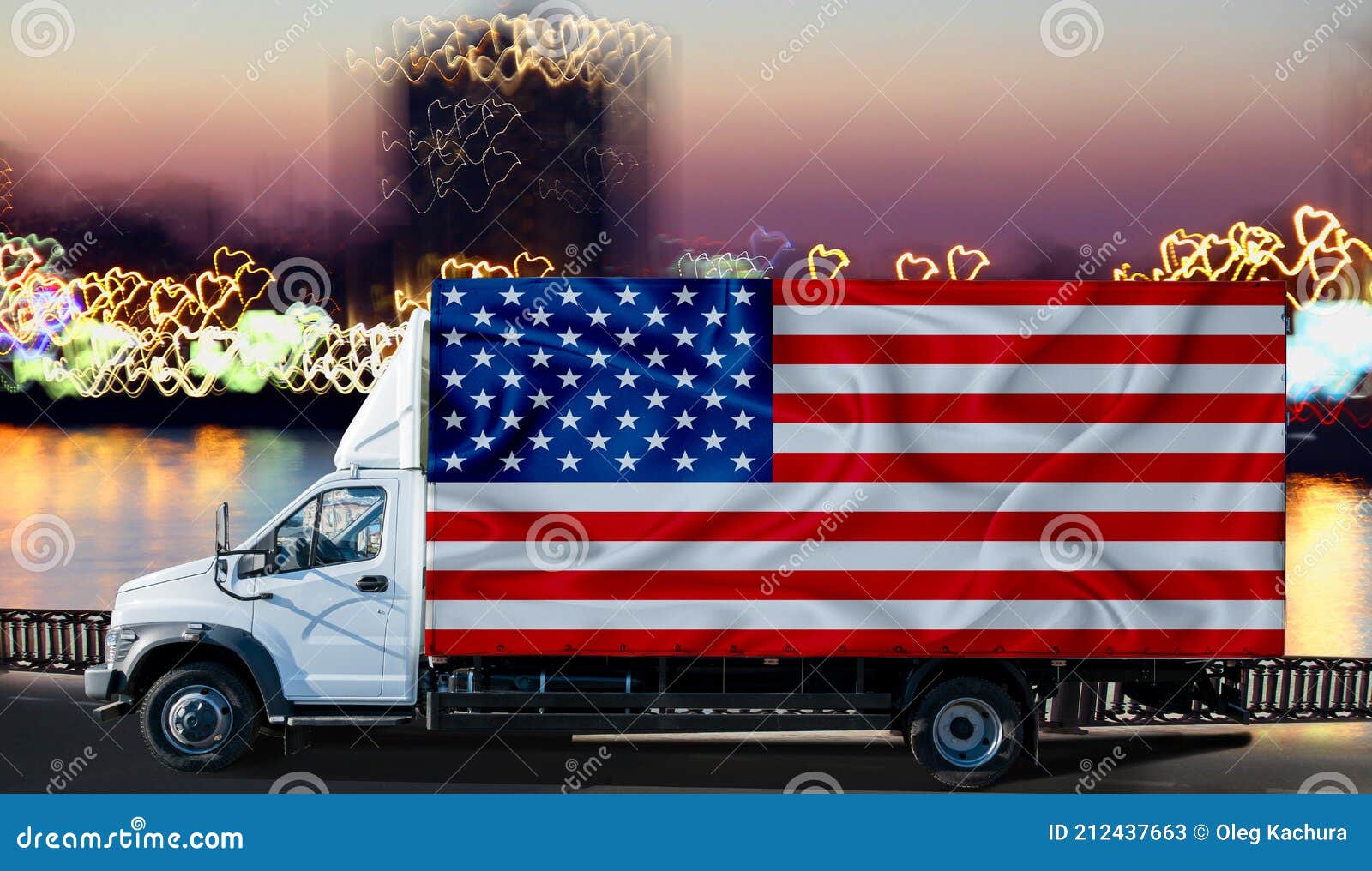 US Flag on the Side of a White Van Against the Backdrop of a Blurred ...