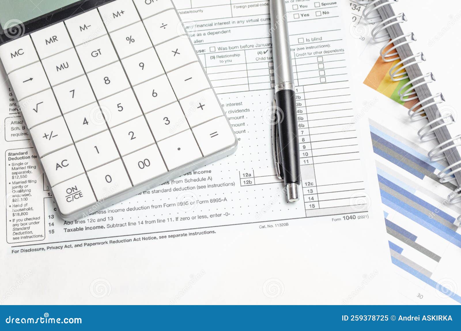 US Individual Tax Return Form 1040 with Calculator and Pen Stock Image ...