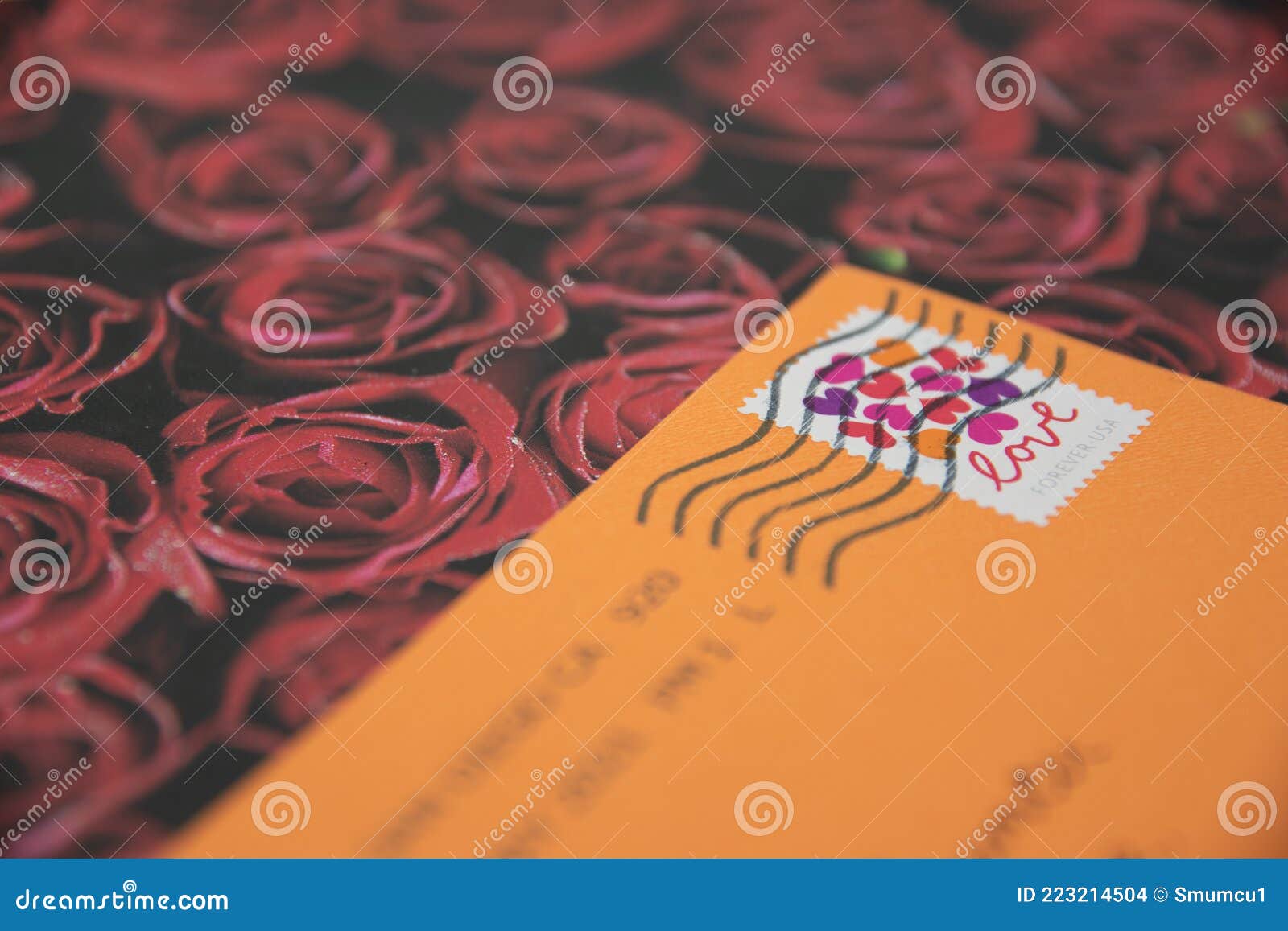 US Love Themed Stamp Close Up on Orange Envelope Stock Photo - Image of ...