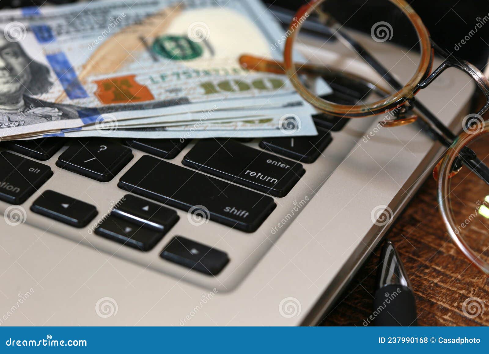 Money on computer keyboard stock photo. Image of technology - 237990168