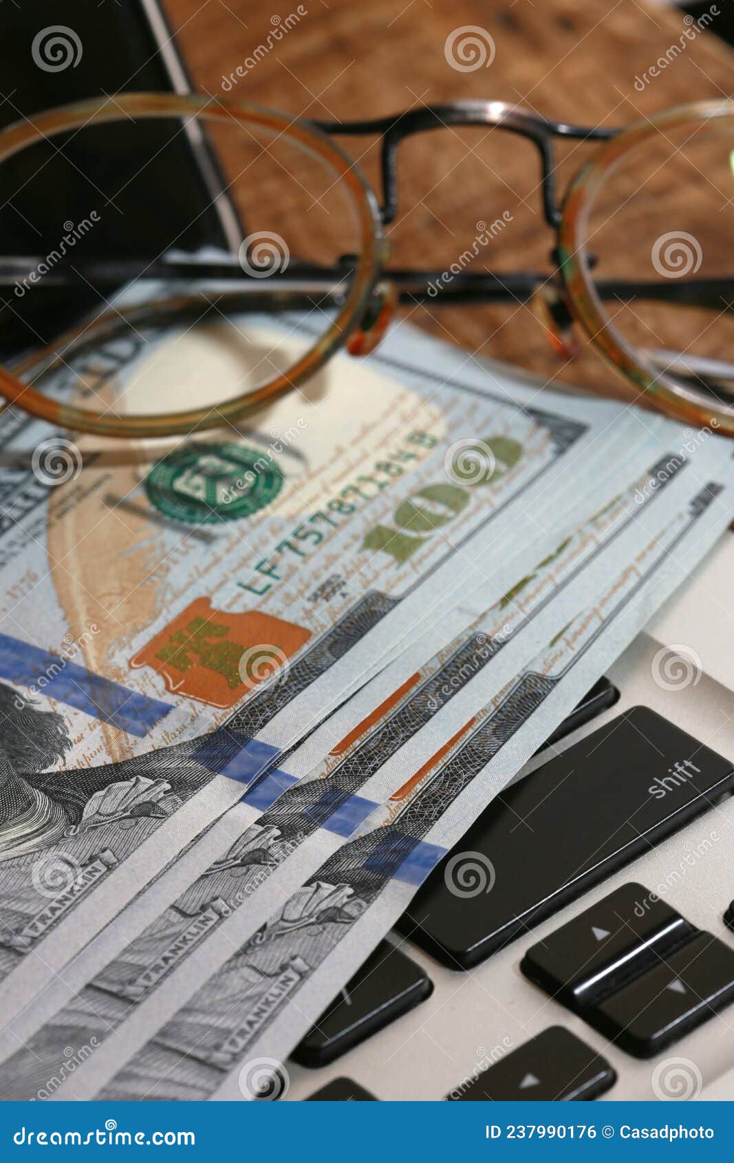 Money on computer keyboard stock photo. Image of internet - 237990176