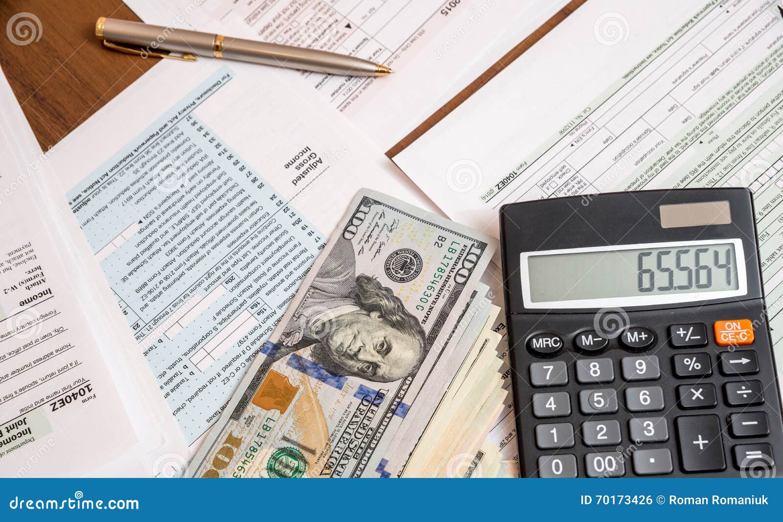 Us Tax Form with Dollar and Calculator Editorial Photo - Image of ...