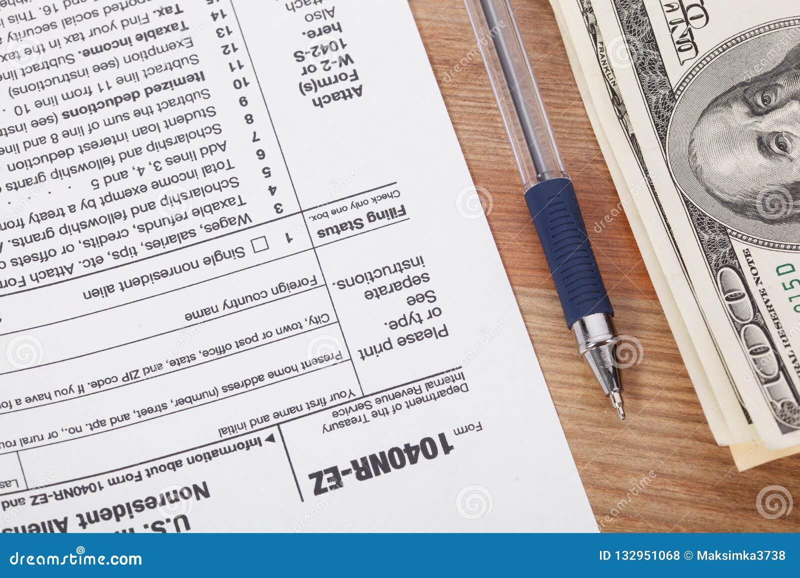 US Tax Form with Pen, on Wooden Table Background. Editorial Stock Photo ...