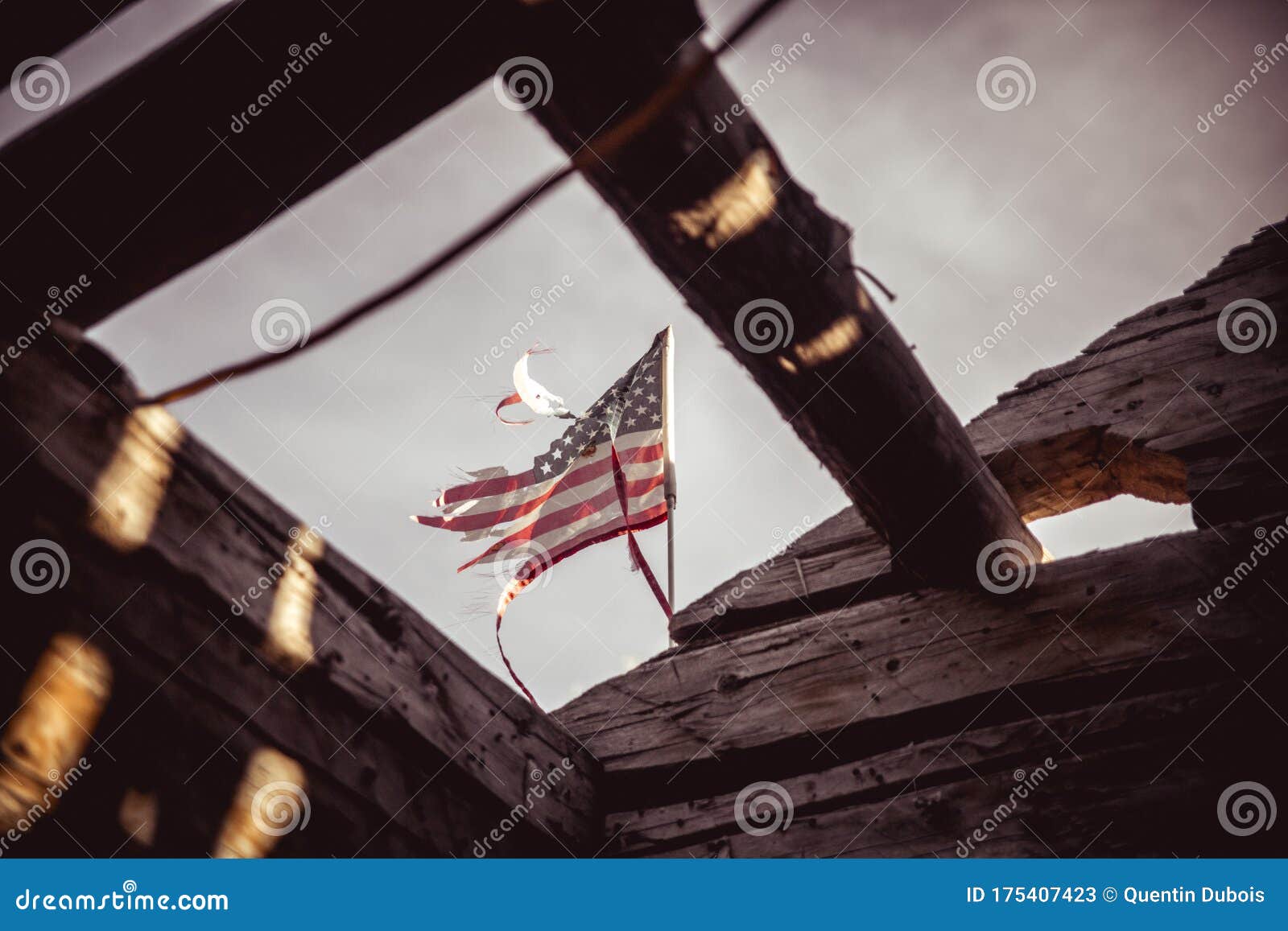 USA Broken Flag Flowting in the Sky with Wood Wall Stock Image - Image ...