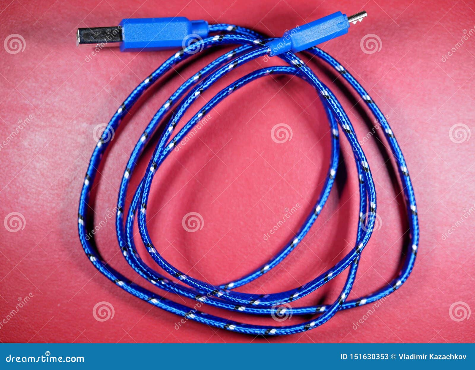 USB Cable in Blue Braid with White Dots on Red Background. Stock Image ...
