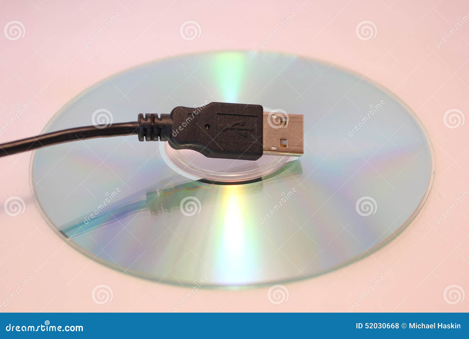 USB cable on CD stock photo. Image of spin, disk, drive - 52030668