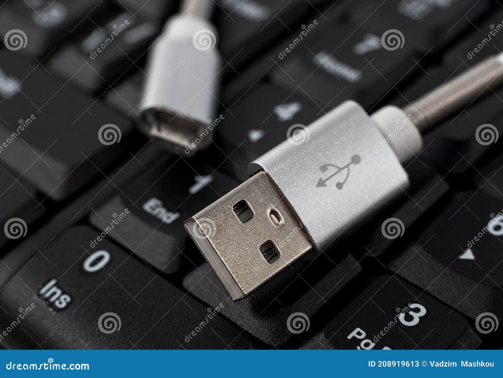 The USB Cable for Charging Peripherals is Located on the Keyboard in ...