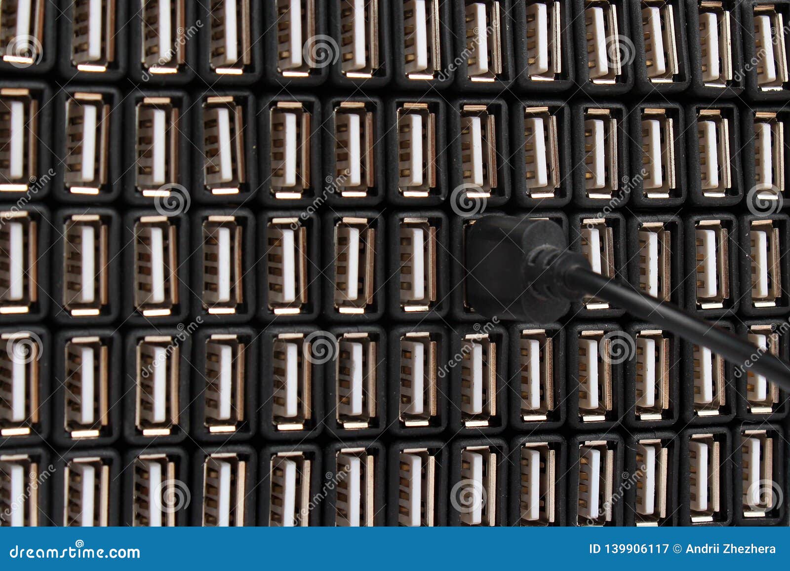A USB Cable Inserted into One of the Many USB Ports Stock Image - Image ...