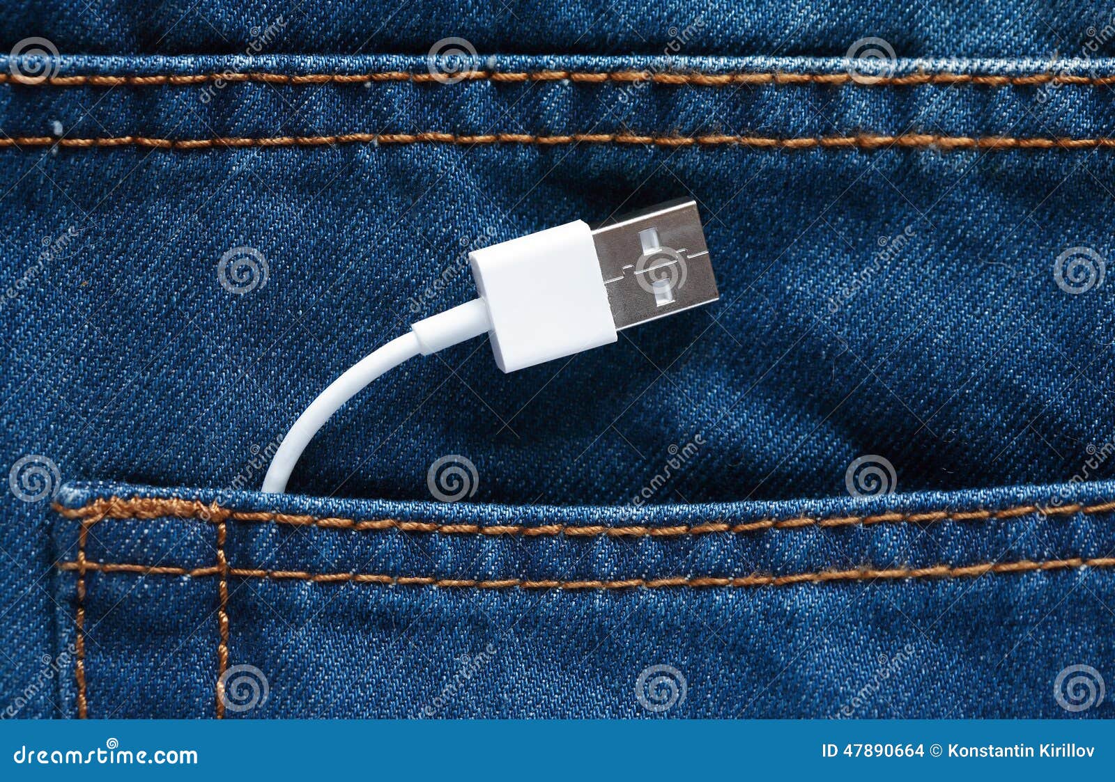 USB-cable in Jeans Pocket stock photo. Image of electronic - 47890664