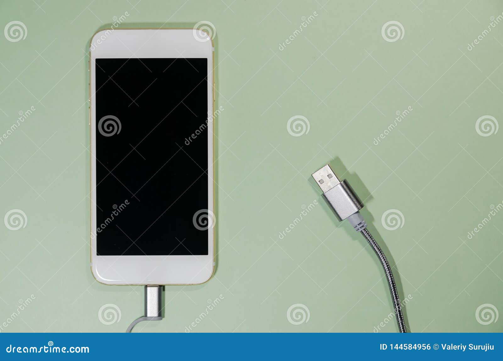 A Charging Phone with Cable Stock Photo - Image of equipment, connector ...
