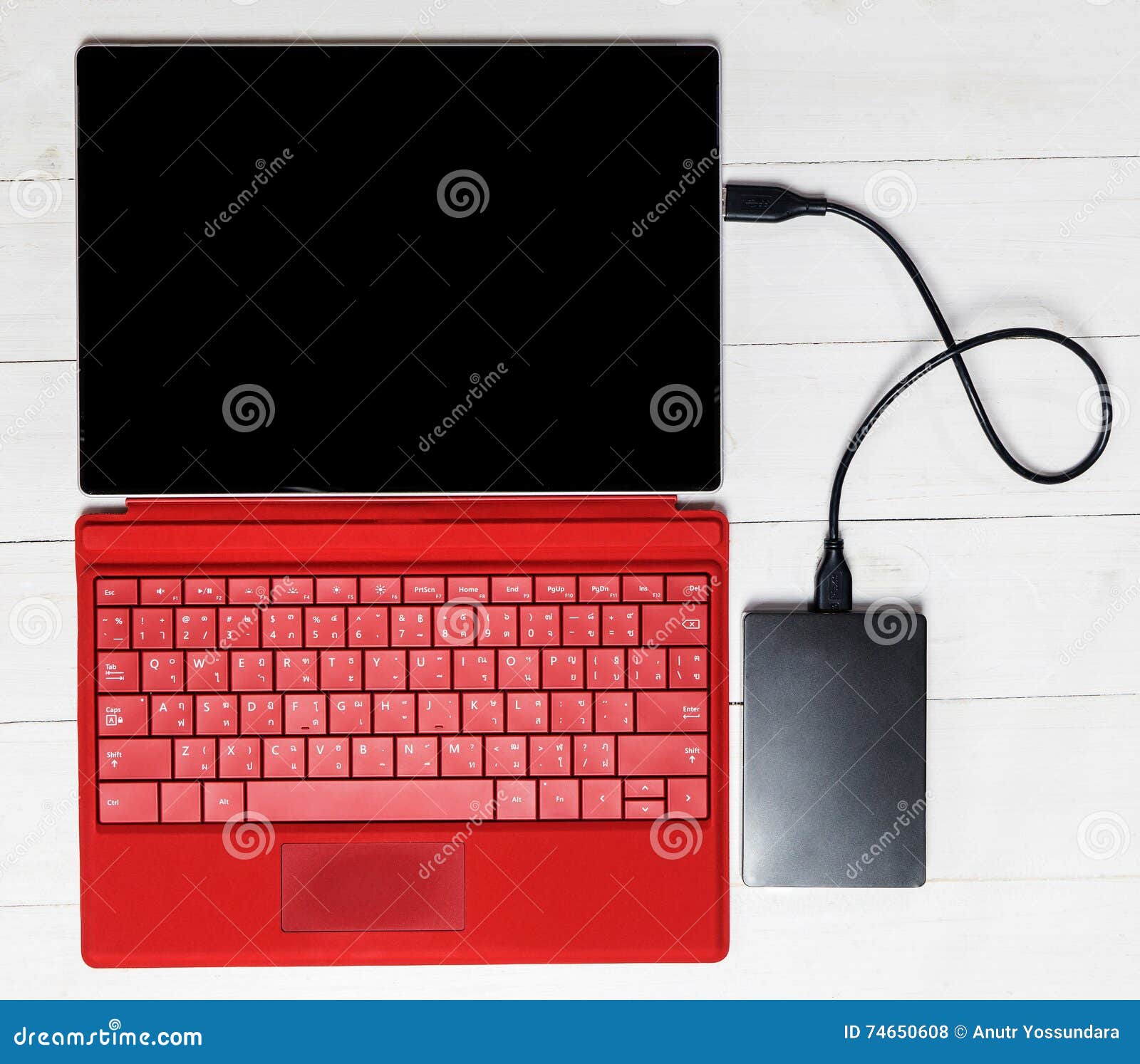USB External Hard Disk on Red Tablet Computer Keyboard Stock Photo ...