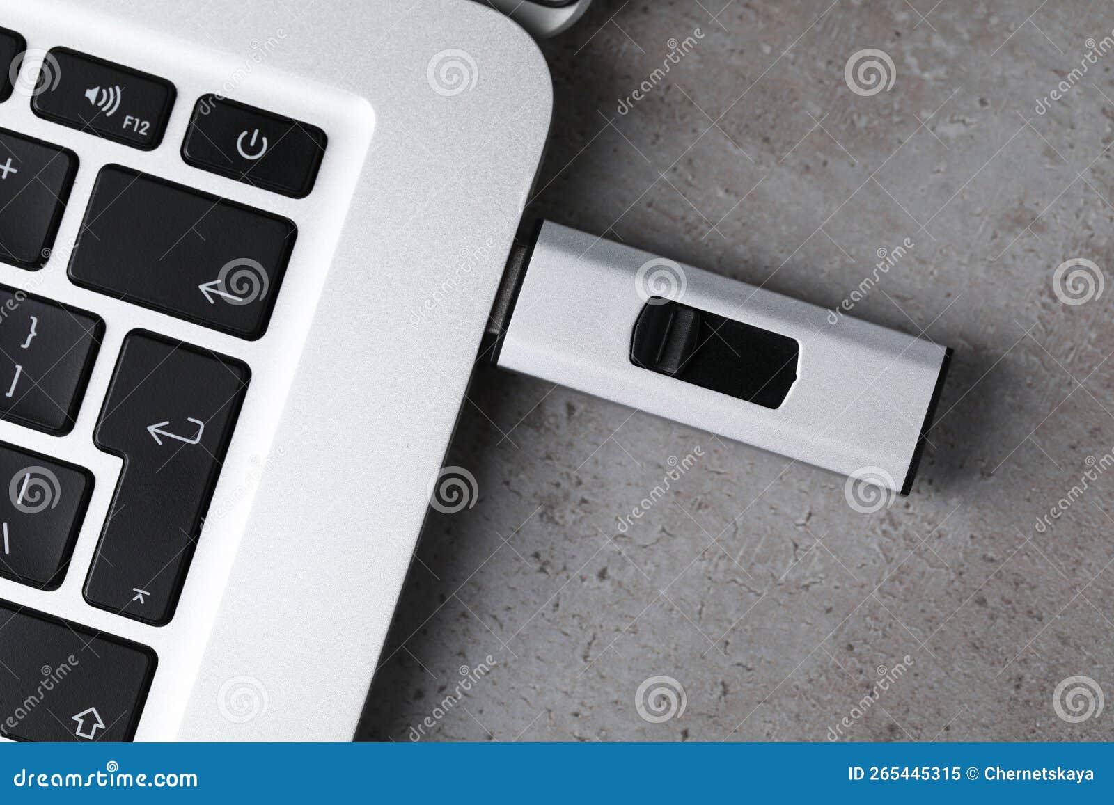 Usb Flash Drive Attached into Laptop on Light Grey Table, Top View ...