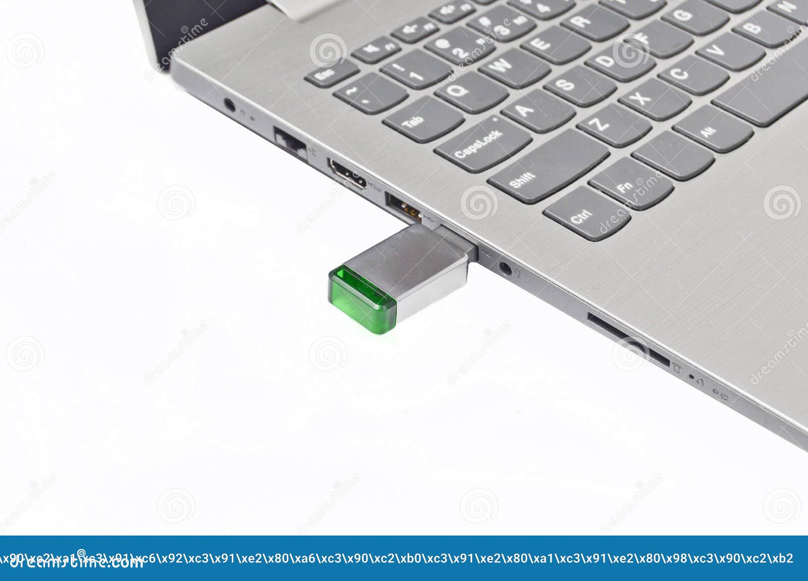 USB Flash Drive Inserted into a Laptop on a White Background. Modern ...