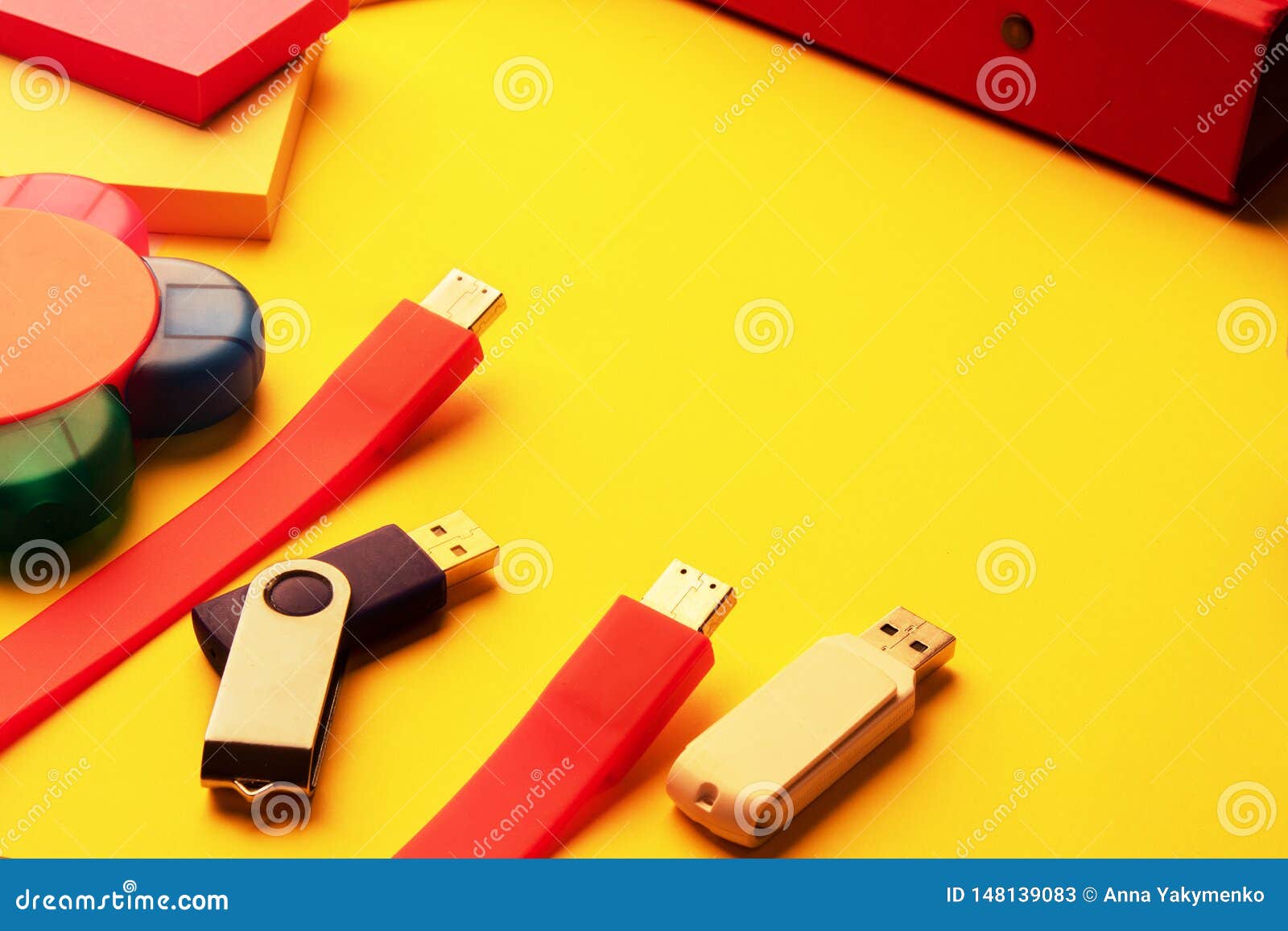 USB Flash Drives of Different Sizes, Colors, Stationery on the Desktop ...