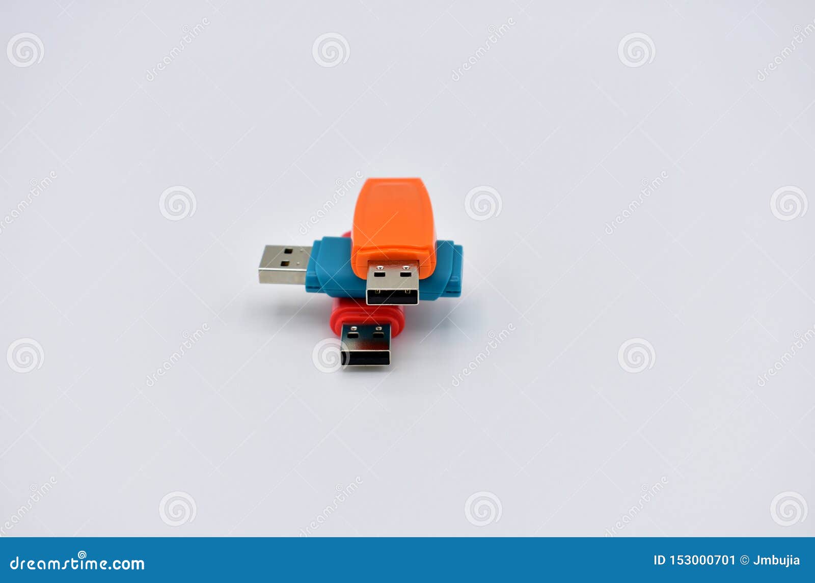 USB Flash Memory Drives with Colours, Orange, Blue and Red, on a White ...