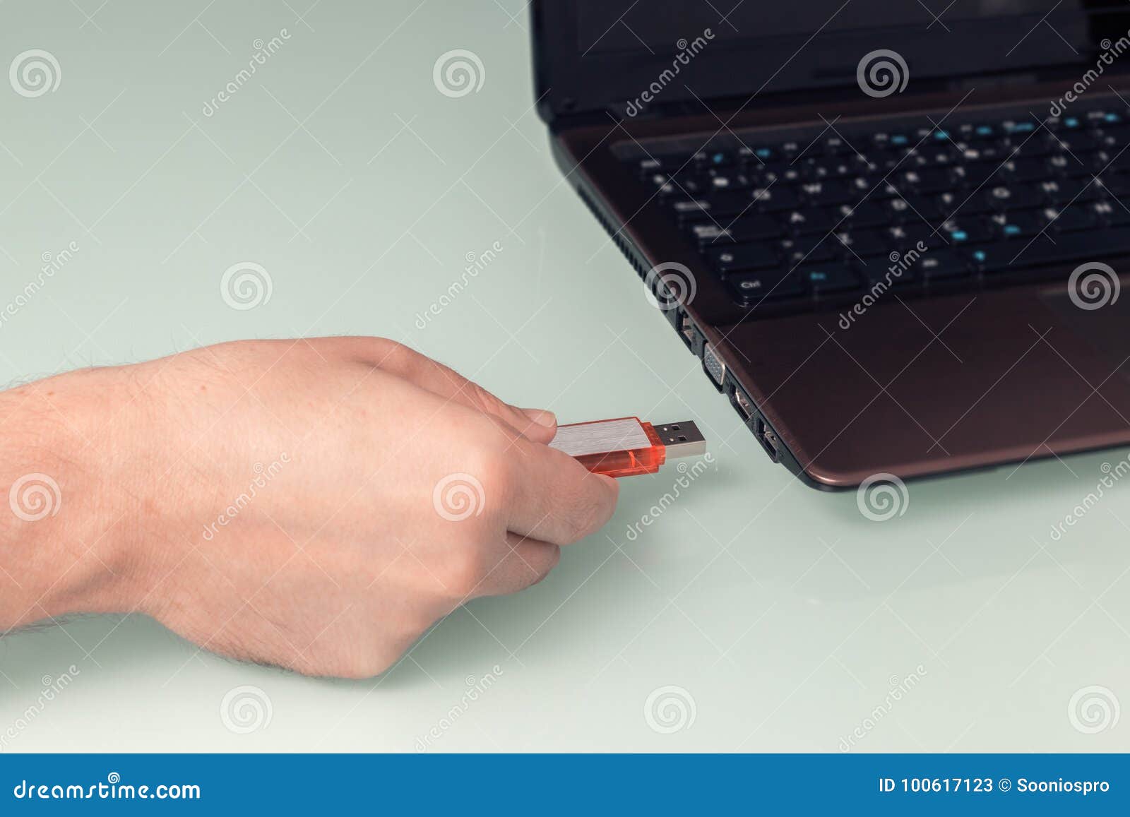 USB Memory Stick on Hand with Notebook Computer Stock Image - Image of ...