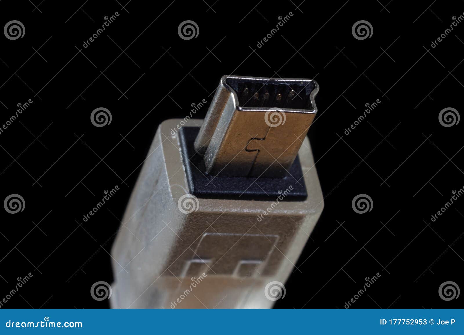 USB Mini B Plug Isolated on a Black Background. Common Digital Cammera ...