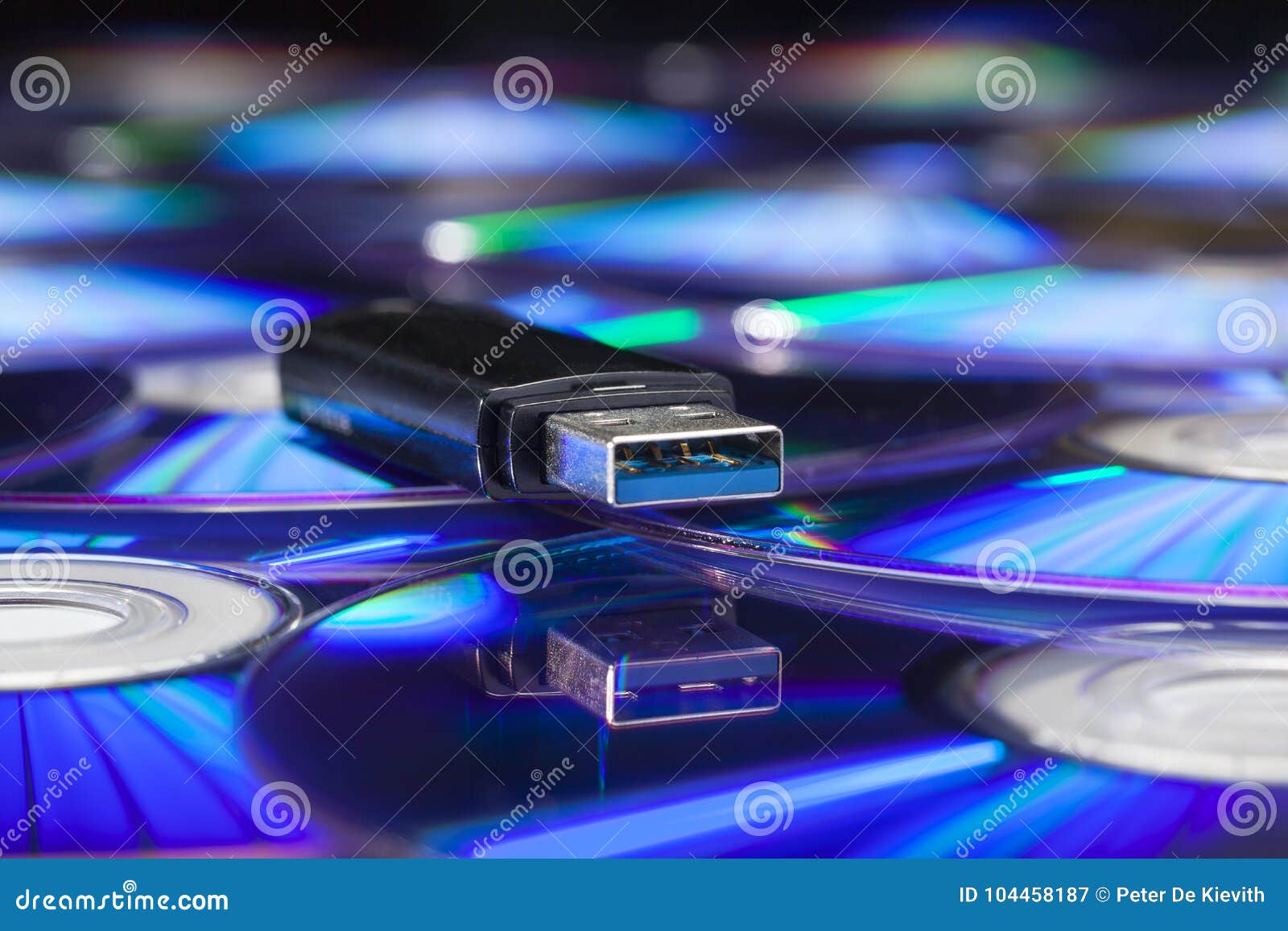 Usb stick on a pile of cds stock image. Image of disc - 104458187