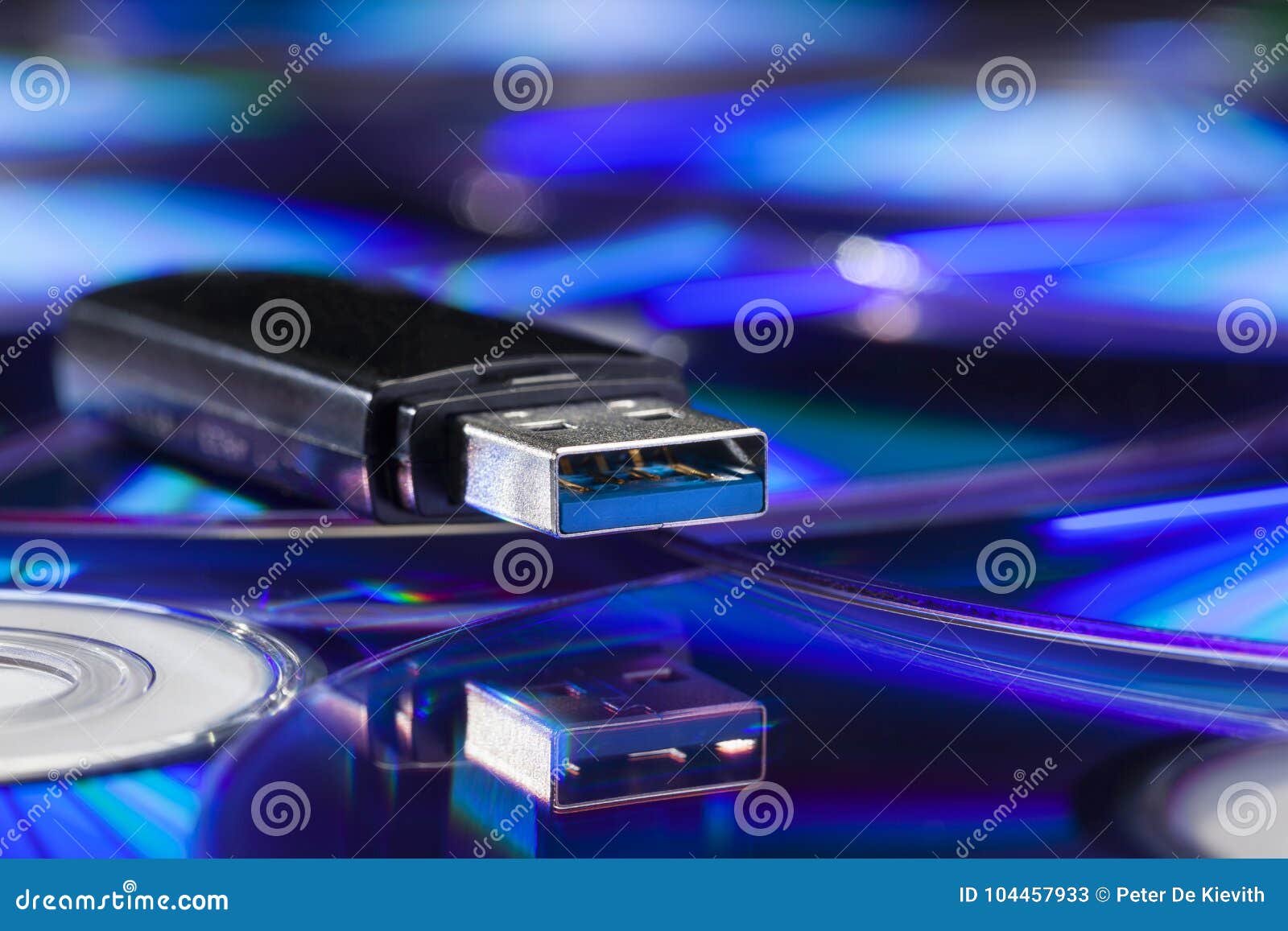 Usb stick on a pile of cds stock image. Image of focus - 104457933