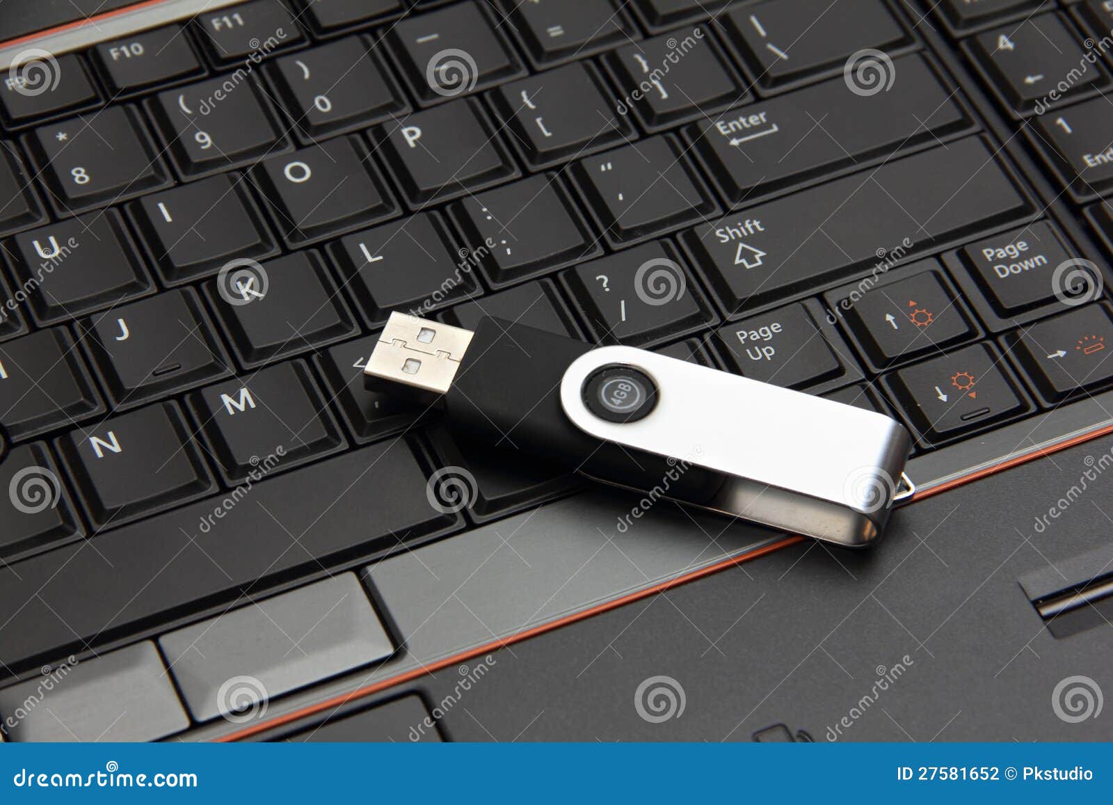 USB Thumb Drive on a Laptop Stock Photo - Image of computer, user: 27581652