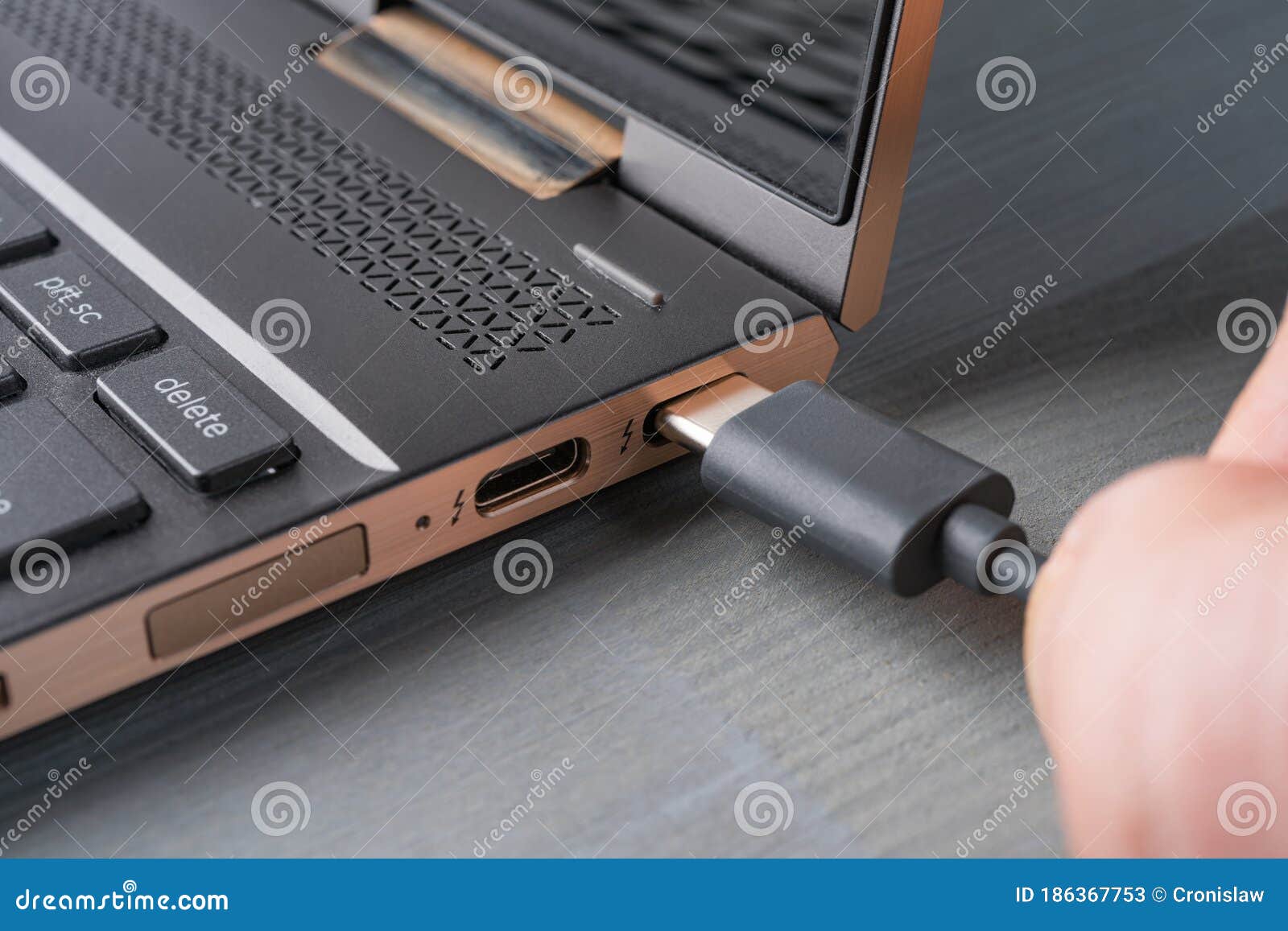 USB Type C Grey Cable Being Connected To the Laptop Stock Image - Image ...