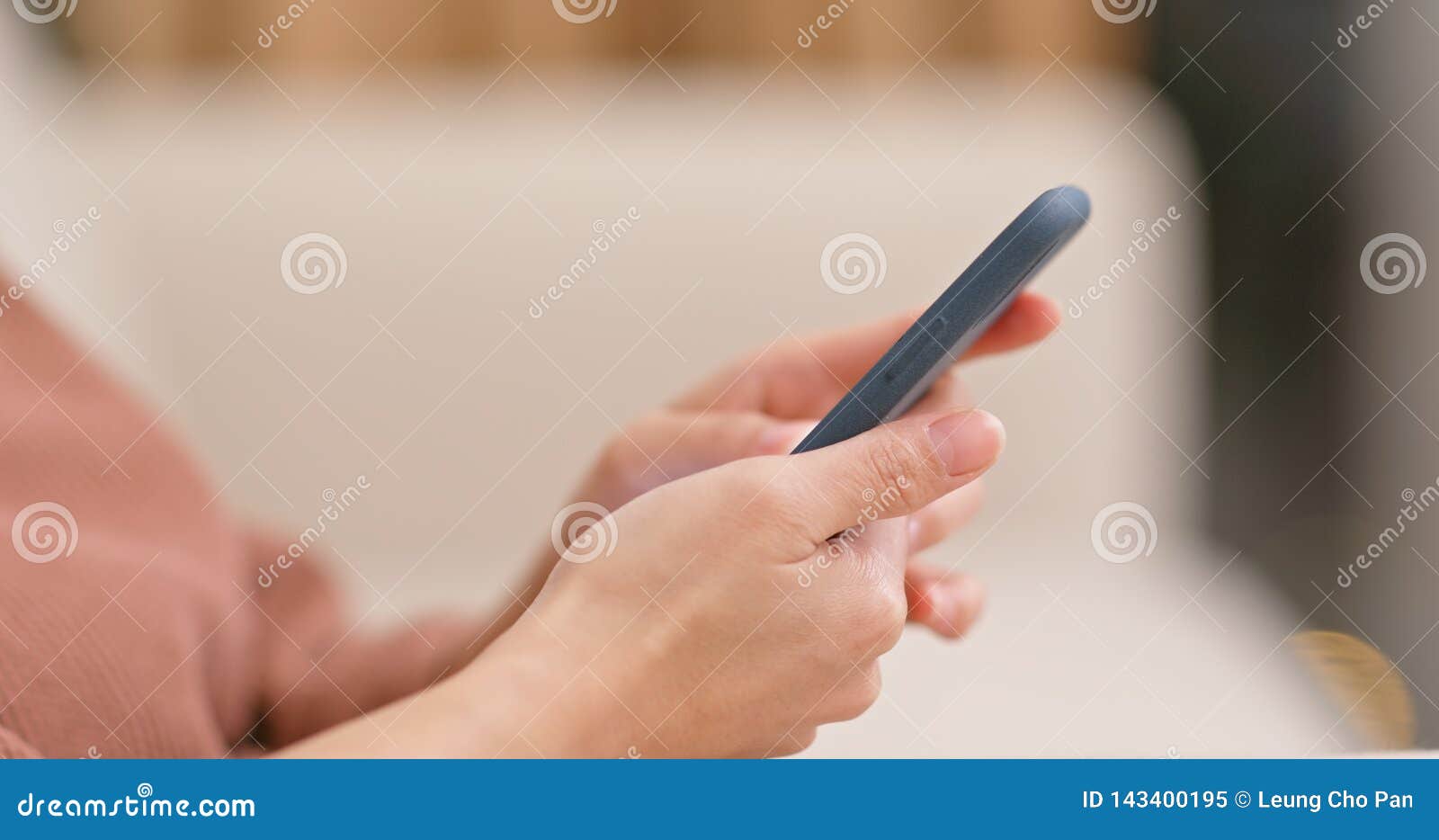 Use of mobile phone stock image. Image of house, indoor - 143400195