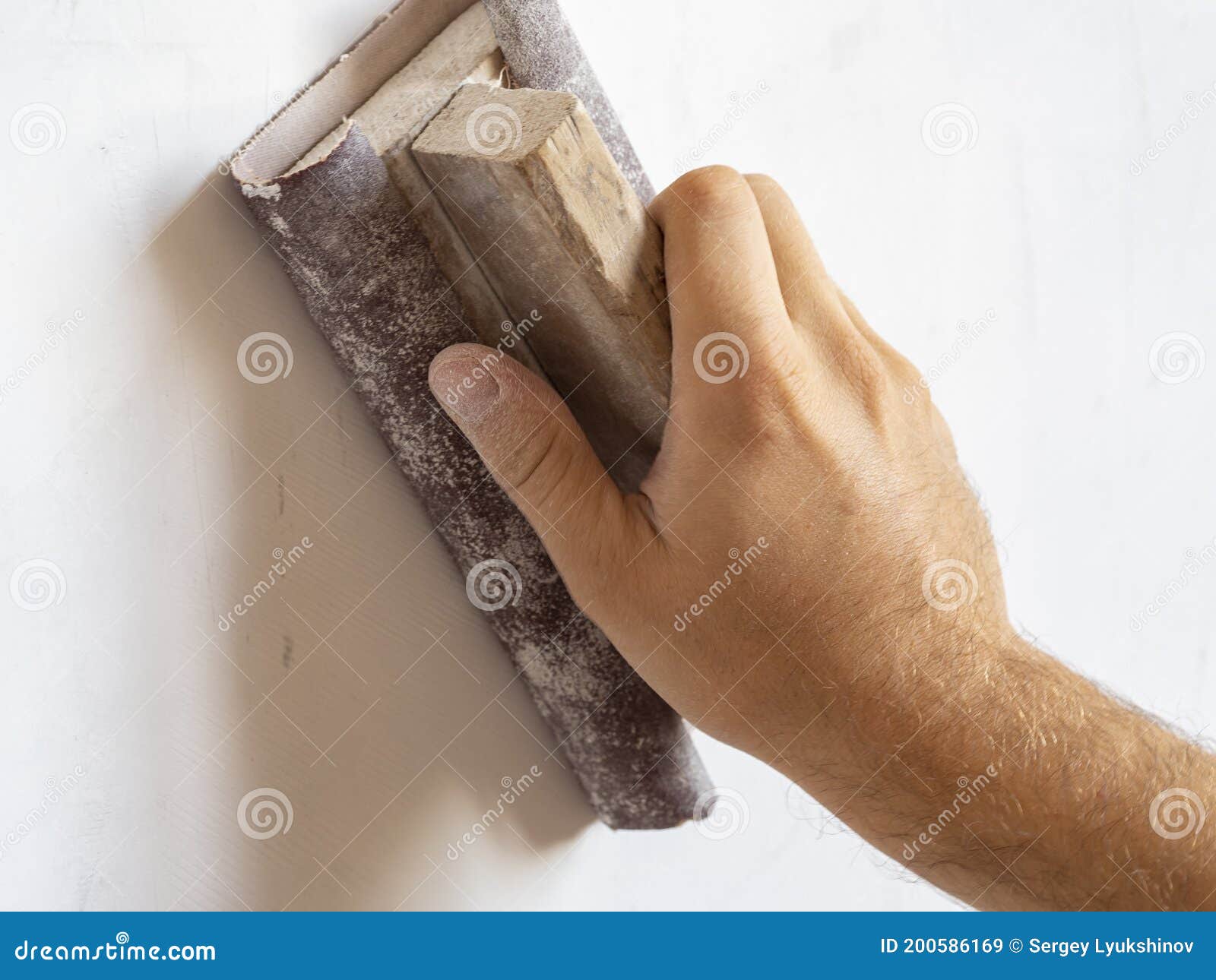 Use Sandpaper To Sand the Wall Surface. Surface Leveling, Work Inside ...