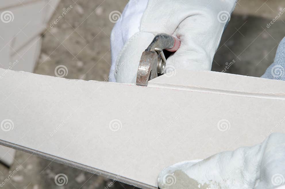 Use of a Tile Nipper To Cut a Tile Stock Photo - Image of tools, work ...
