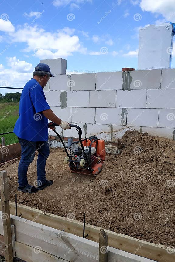 Use of a Vibrating Plate on Construction, Heavy Construction Tools and ...