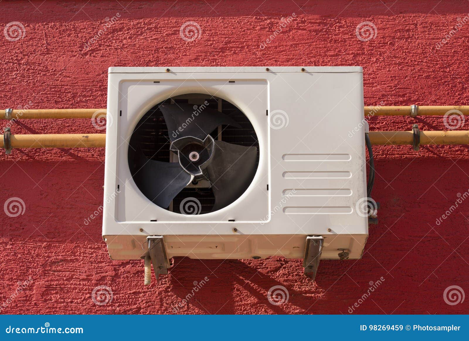 Used Air Conditioner on a Red Wall Stock Image - Image of power ...
