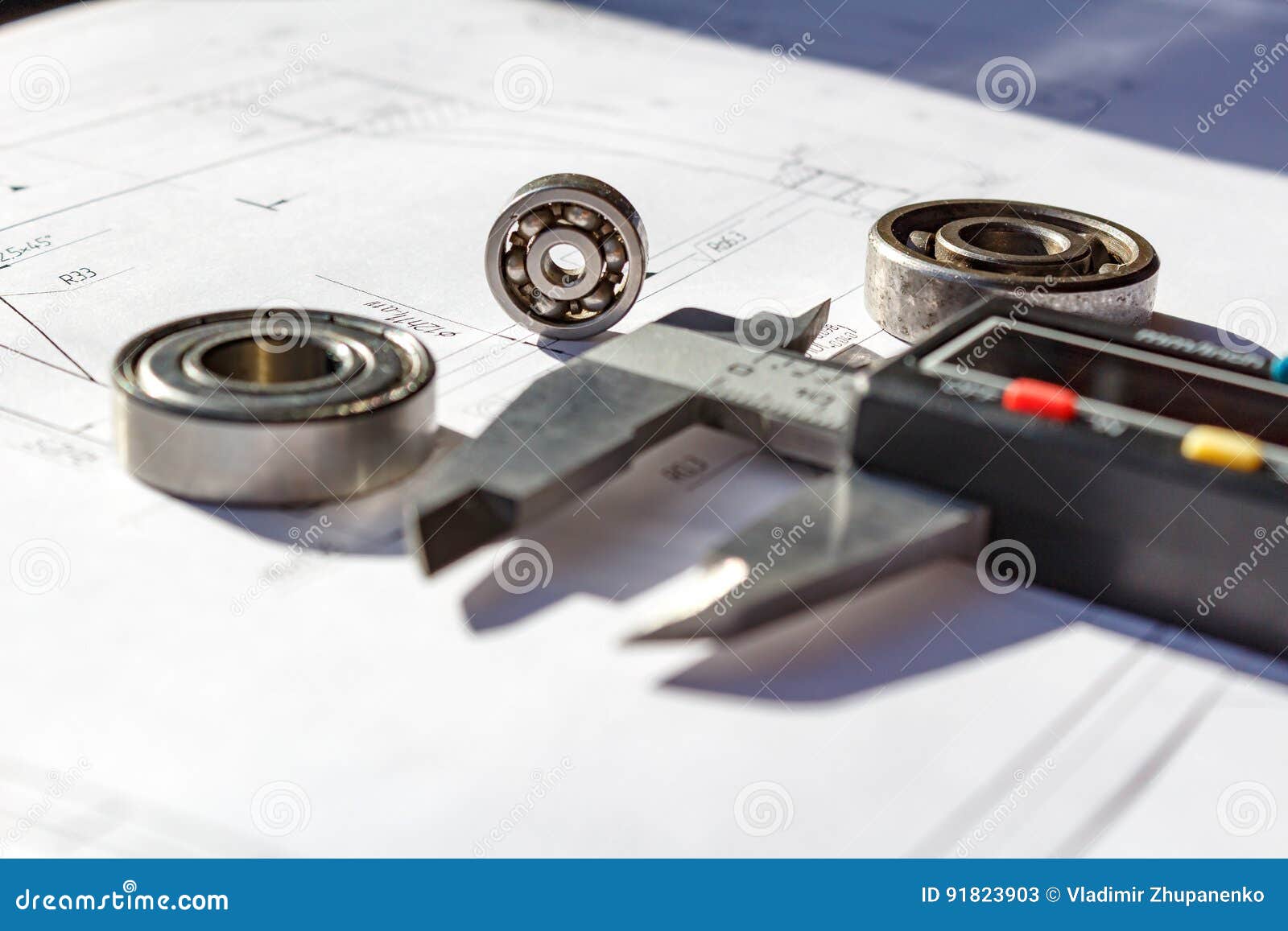 Used Ball Bearings and Electronic Calipers on a Table Closeup Stock ...